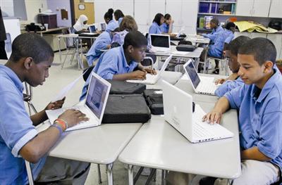 Laptops in for teachers as US education goes hi-tech - eb247 ...