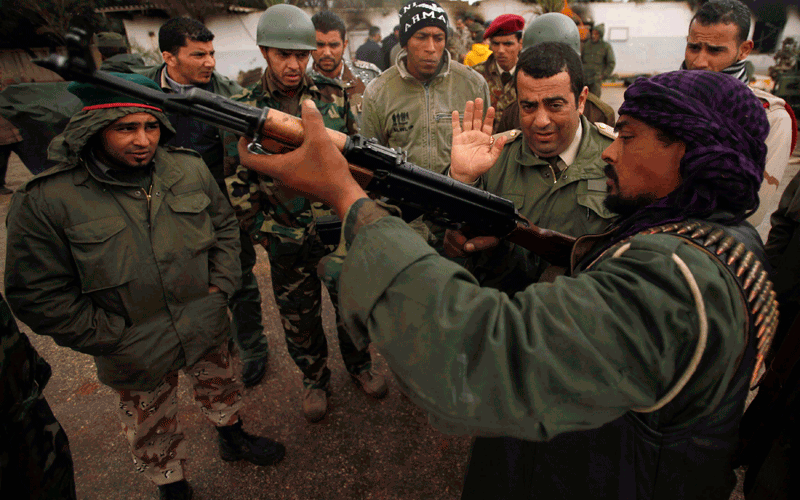 Armed Gaddafi opponents hold town west of Tripoli - News - World ...