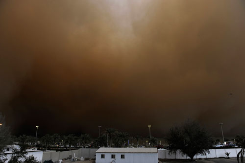 Sandstorm halts Kuwait; UAE dusty, overcast - News - Region - Emirates24|7