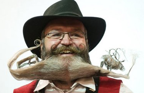 German hairdresser lifts 'best beard' trophy - Offbeat - Emirates24|7