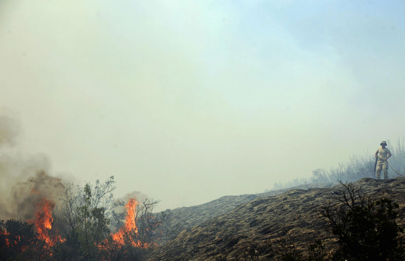Army, firefighters keep fires from Serbian villages - News - World ...