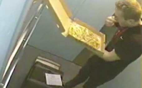 Pizza delivery man caught picking toppings from customer's pizza ...