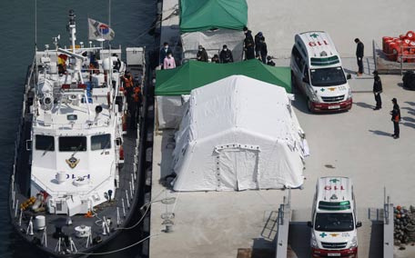South Korean ferry horror: Divers feel with their hands for child ...