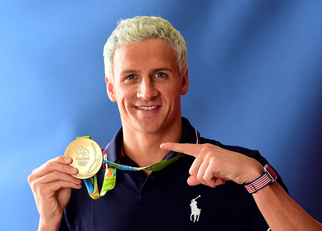 US swimmer Lochte says gun held to head in Rio taxi hold-up - Sports ...